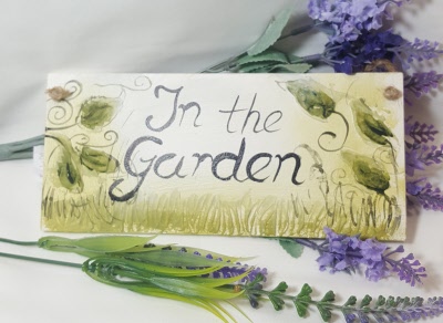 IN THE GARDEN Sign